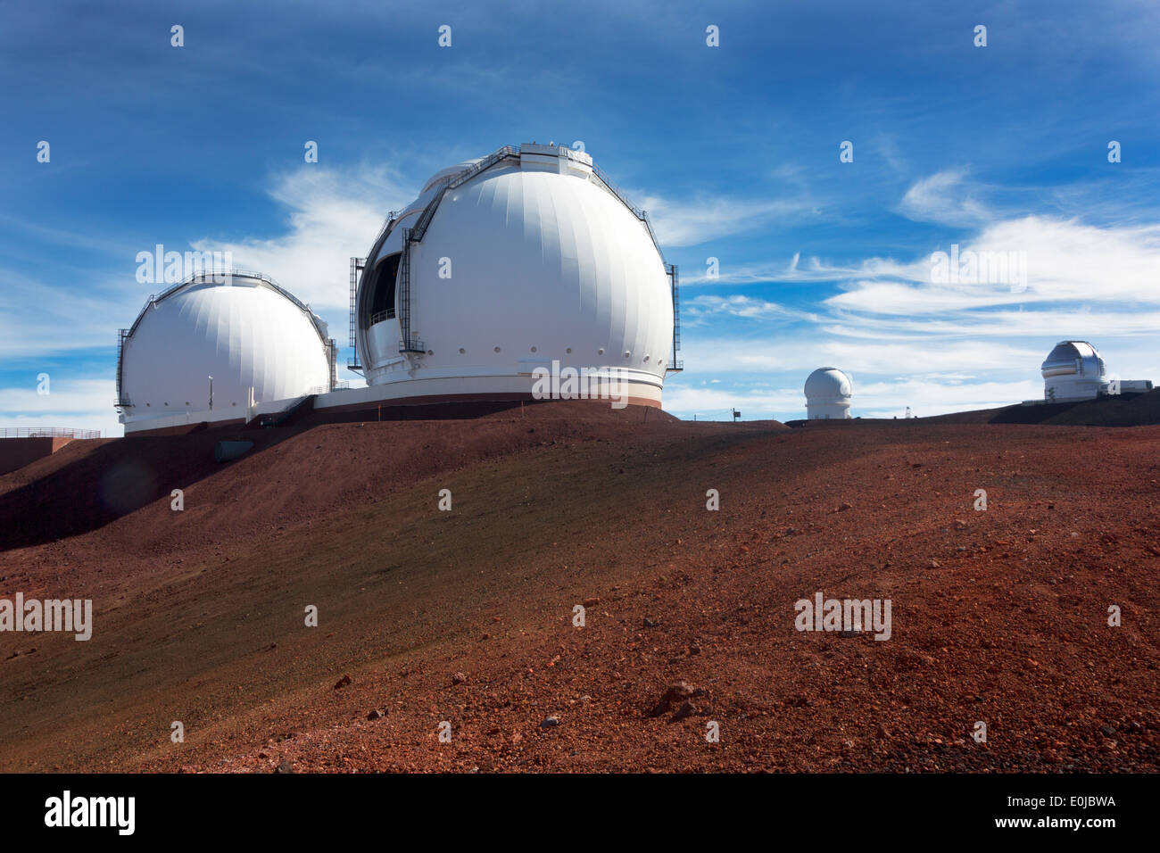 Astronomy telescope observatory atop volcanic landscape on Mauna Kea on ...