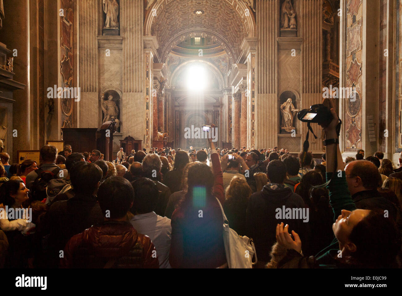 Crowds in the interior of St Peters Basilica, Vatican City, Rome Italy ...