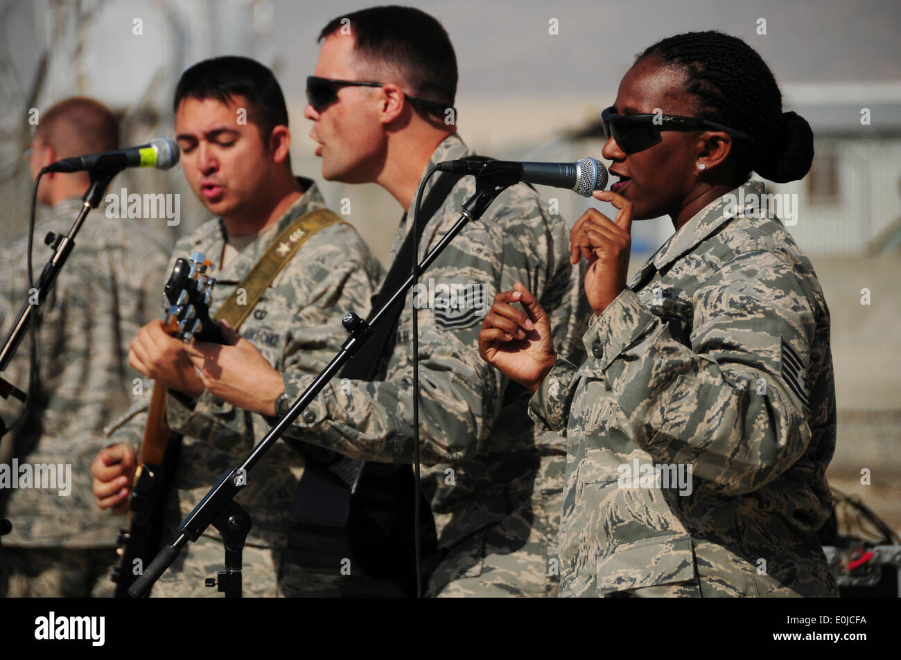 Tech. Sgt. Amber Grimes sings during a “Top Cover” performance at ...
