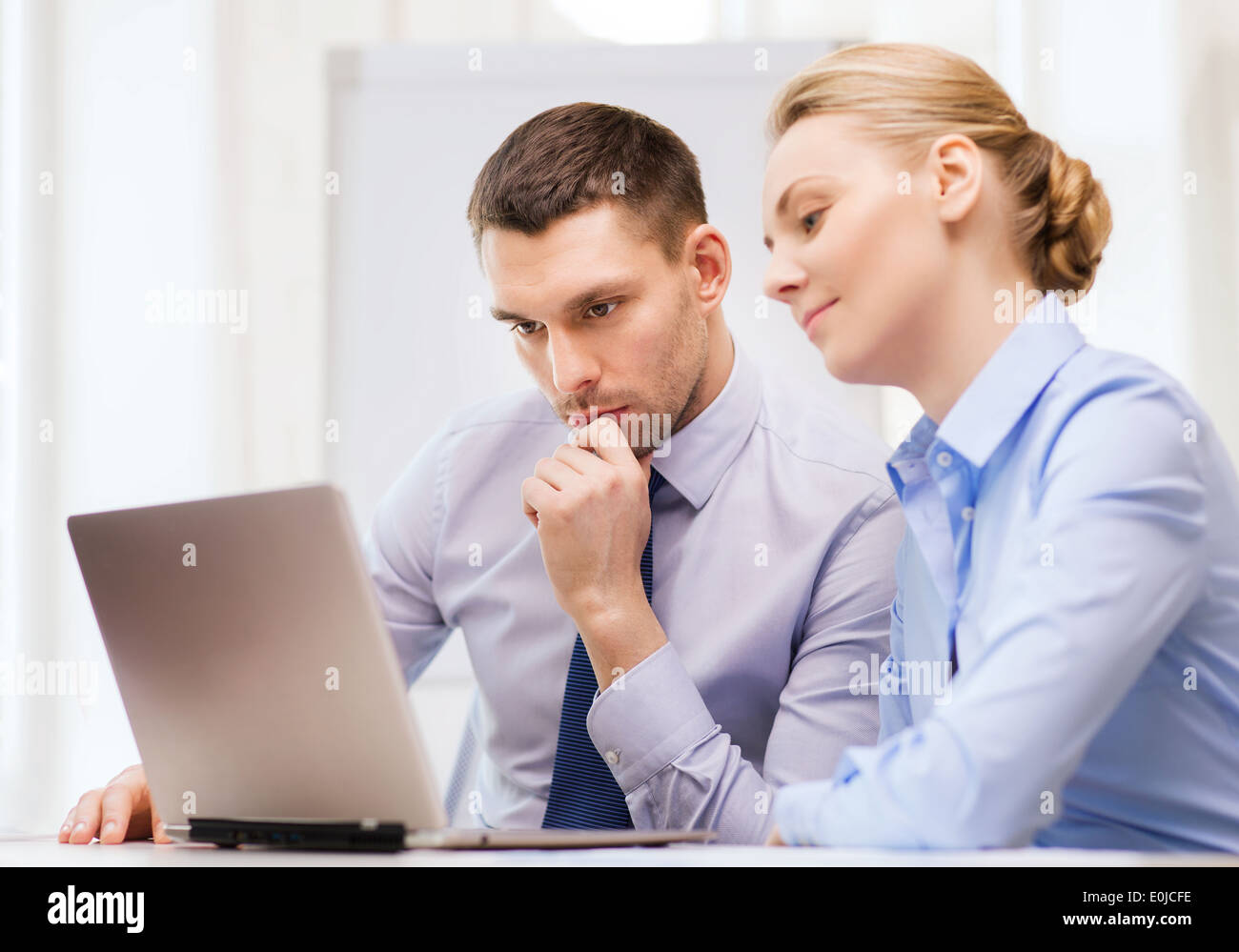 Group discussion computer serious hi-res stock photography and images ...