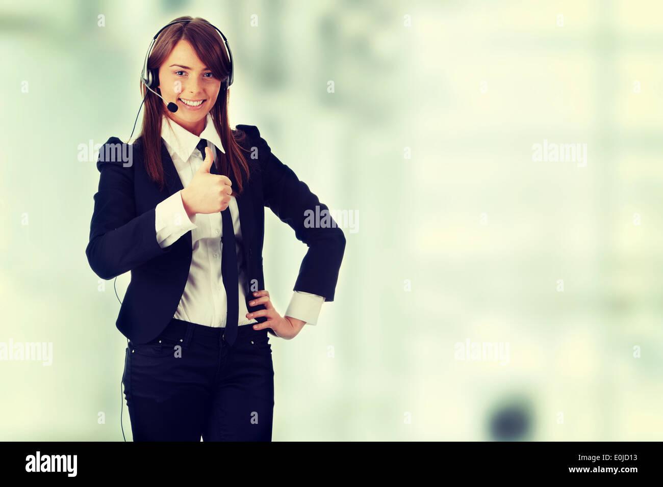 Call center girl thumbs up hi-res stock photography and images - Alamy