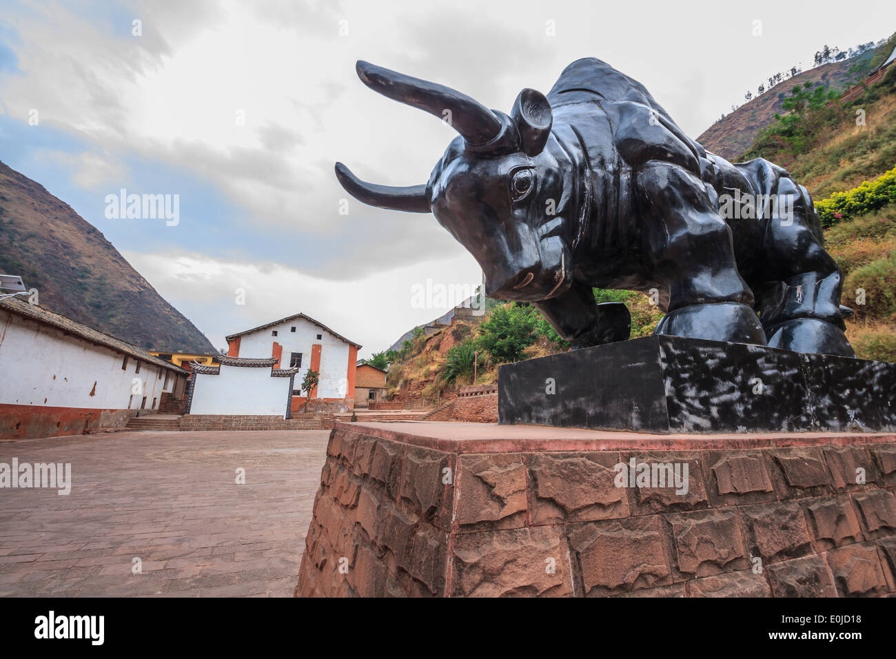 Statue of black ox at Heijing Ancient Town in Yunnan, China Stock Photo ...