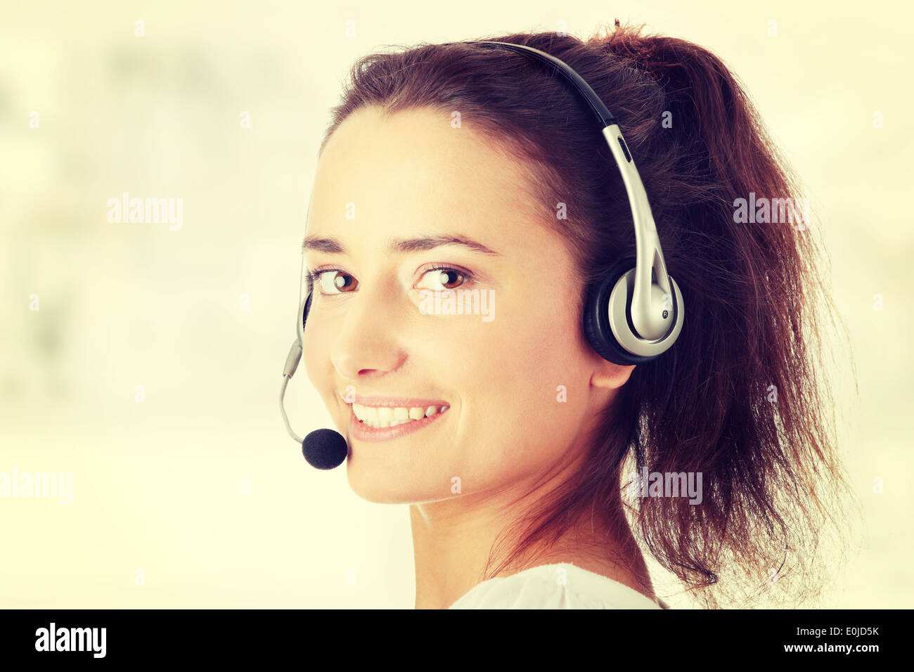 Young call center worker Stock Photo - Alamy