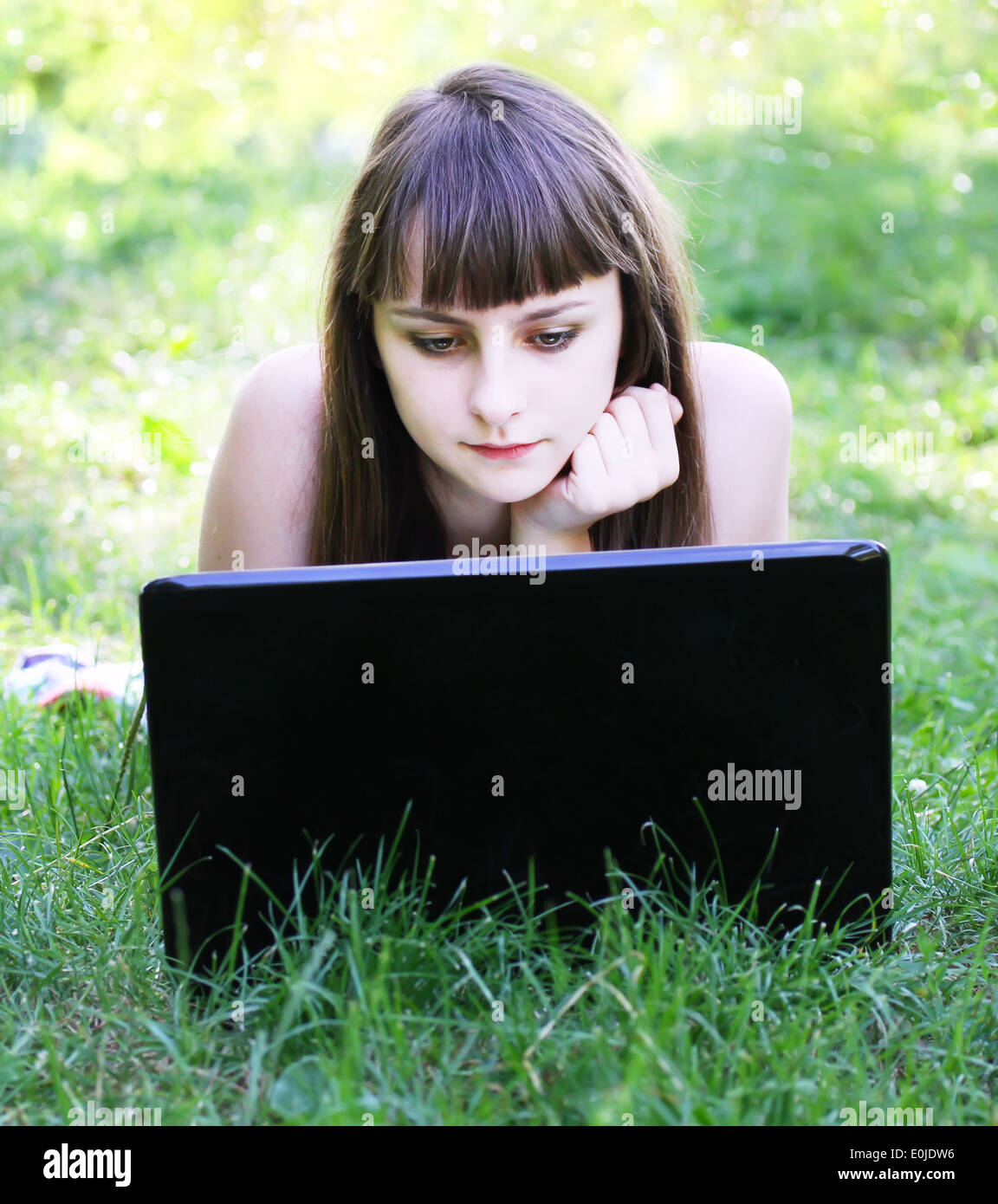 Beauty girl with laptop outdoors Stock Photo - Alamy