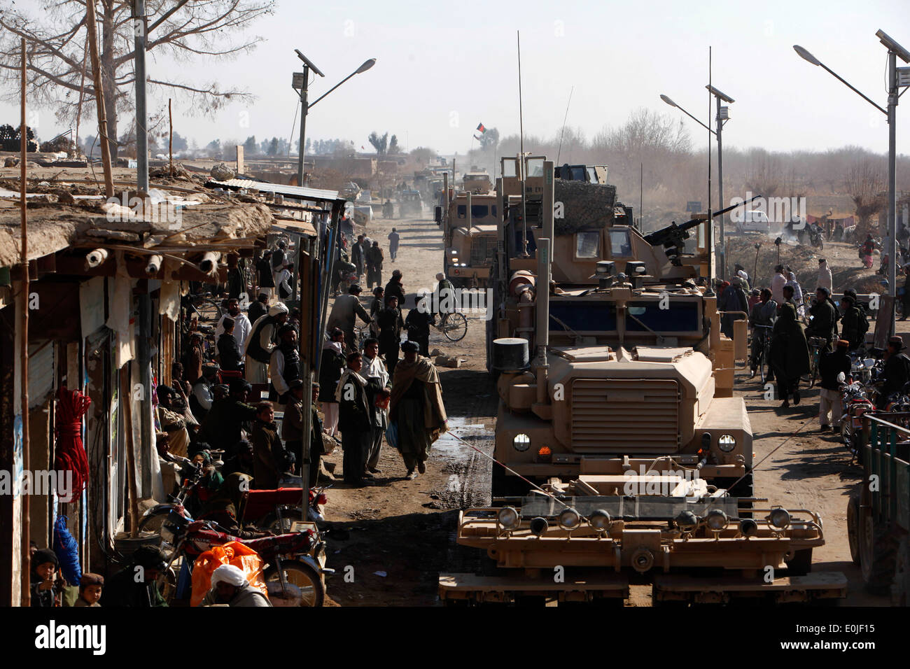Convoy through a busy bazaar in marjah hi-res stock photography and ...