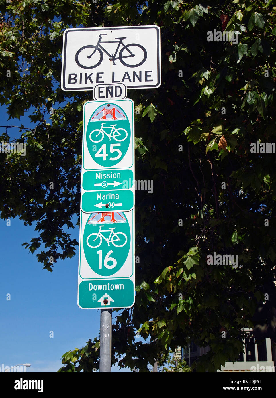 Bike lane direction signs San Francisco Stock Photo - Alamy