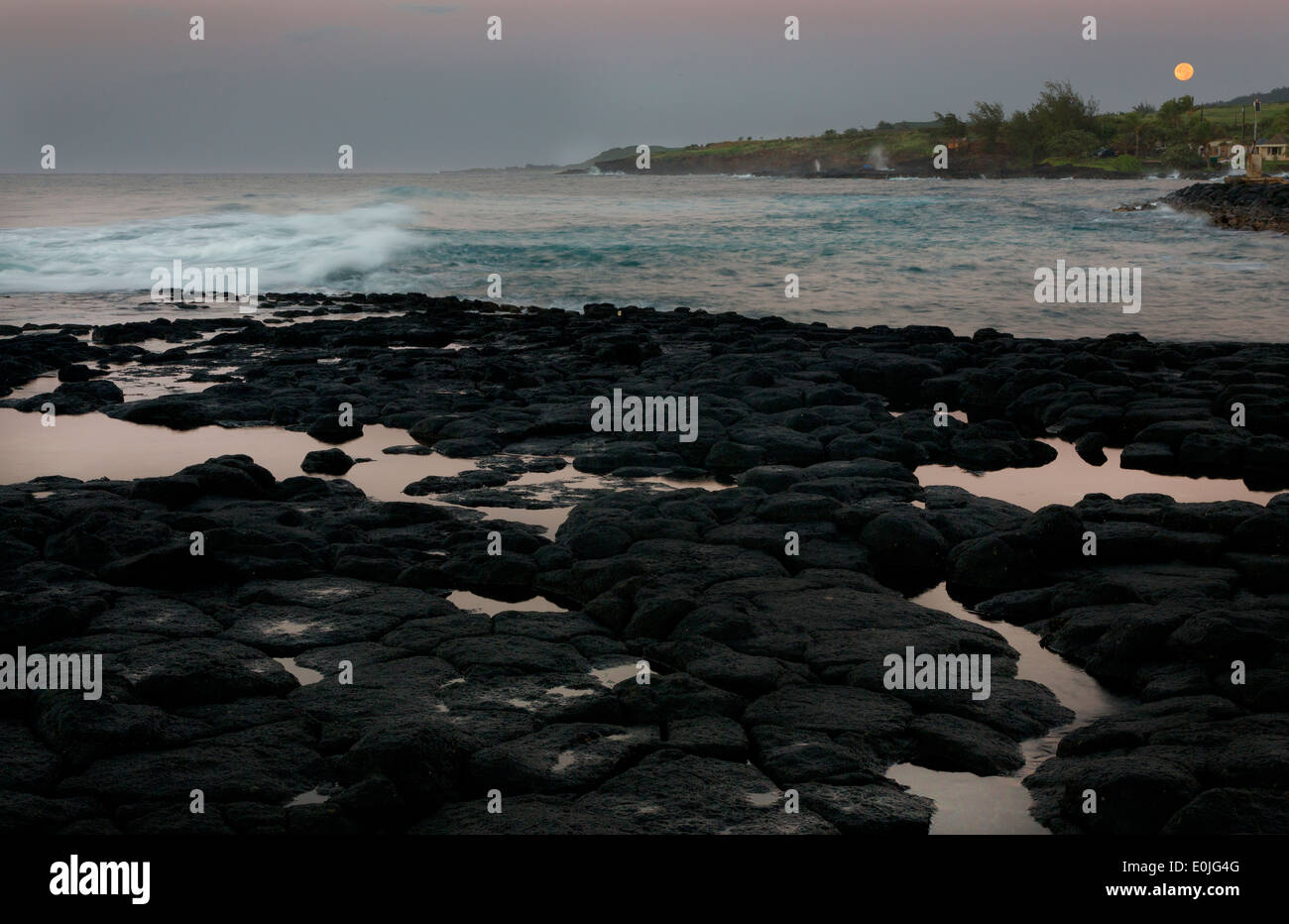 Full Moon over Kukui'ula harbor Kauai, Hawaii Stock Photo - Alamy