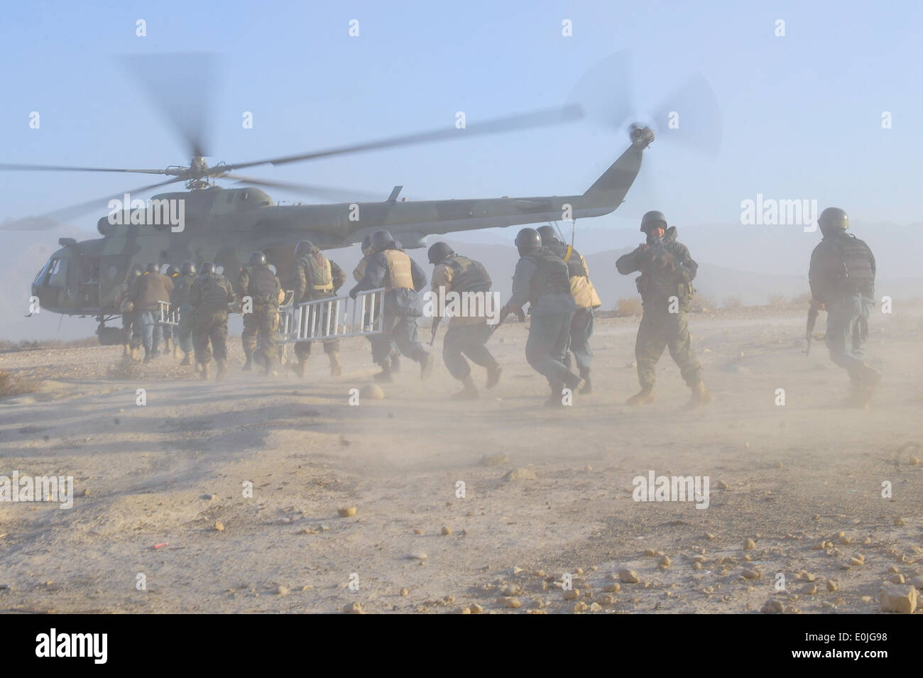 Members of the Afghan National Police Crisis Response Unit board a MI ...