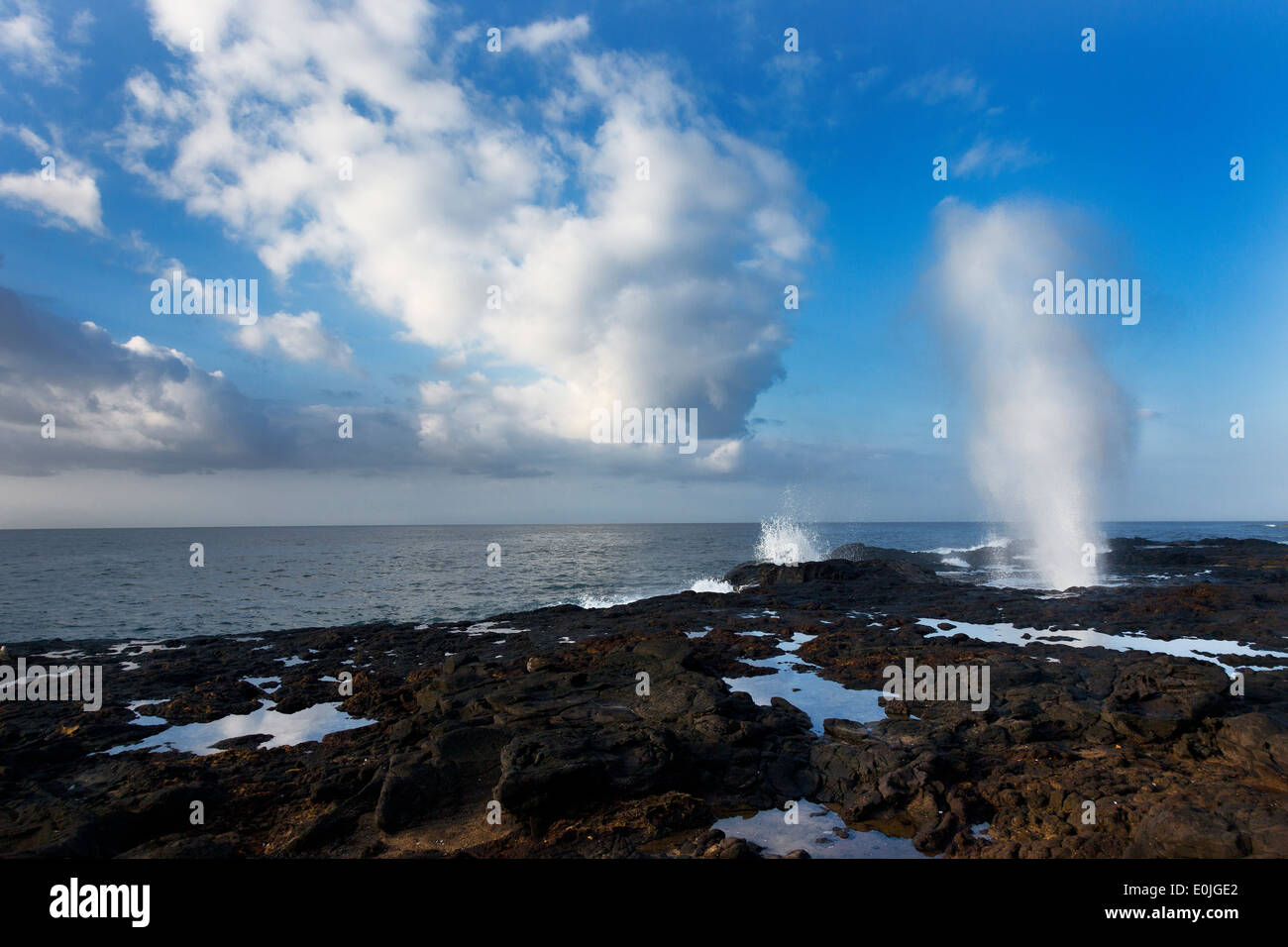 Blow hole at Spouting Horn, South shore, Kauai, Hawaii Stock Photo - Alamy