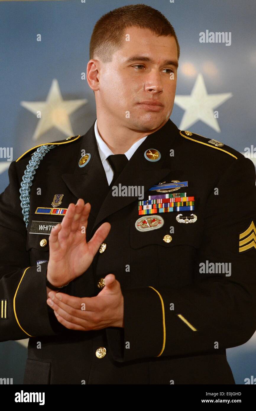 Former U.S. Army Sergeant Kyle White applauds fellow soldiers during ...