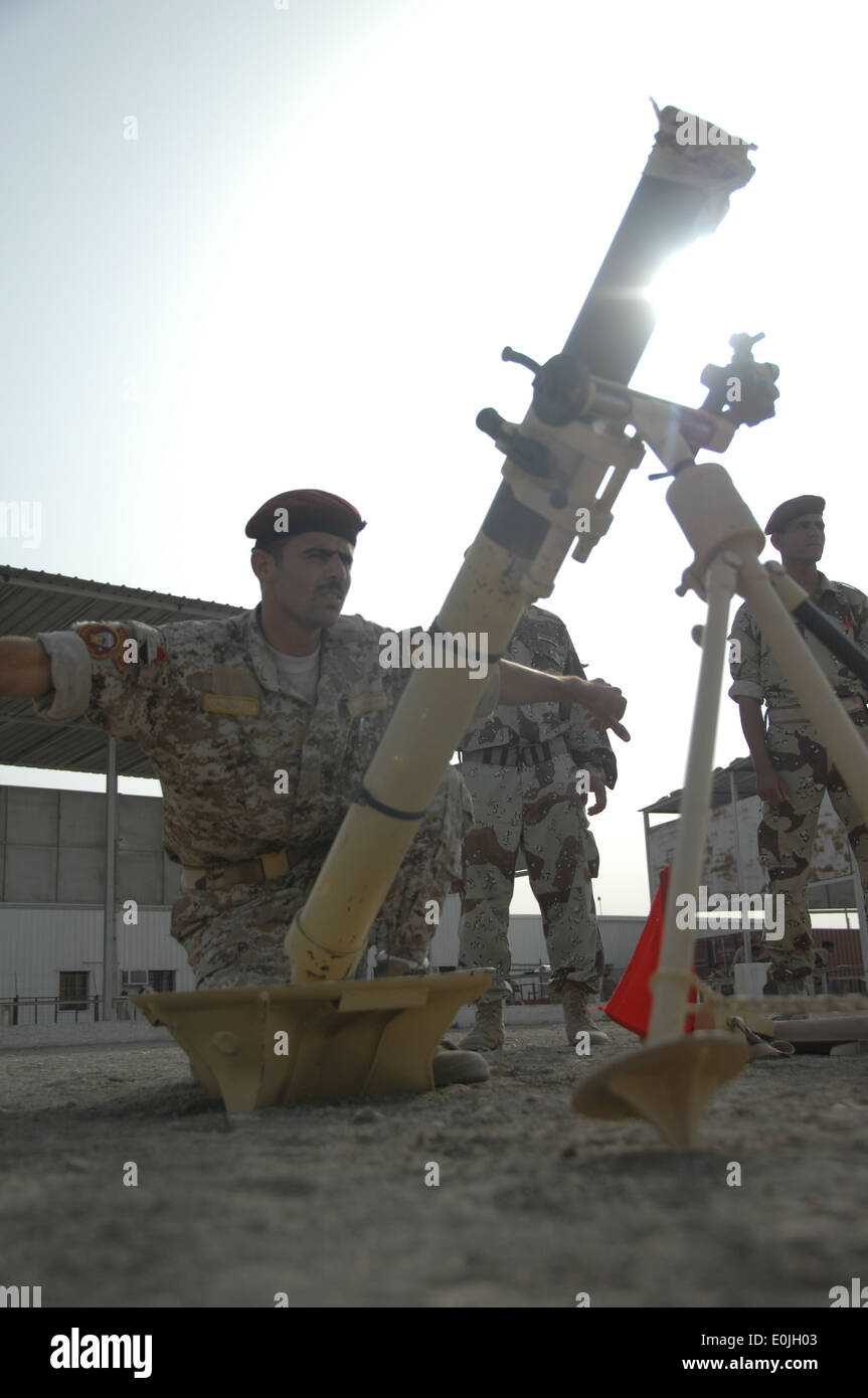 Iraqi soldiers, assigned to the 10th Iraqi Army Division, conduct timed ...
