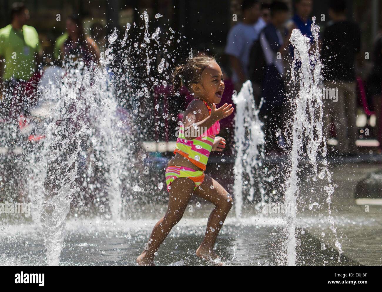Los Angeles, California, USA. 14th May, 2014. A girl plays in a ...