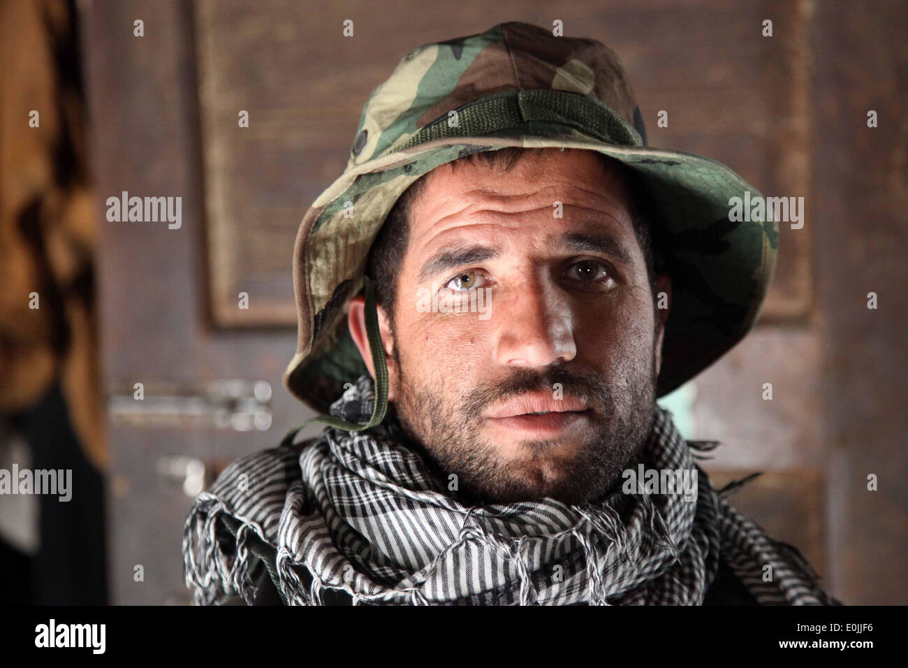 An Afghan commando from 2nd Commando Kandak rests during a lull in a ...