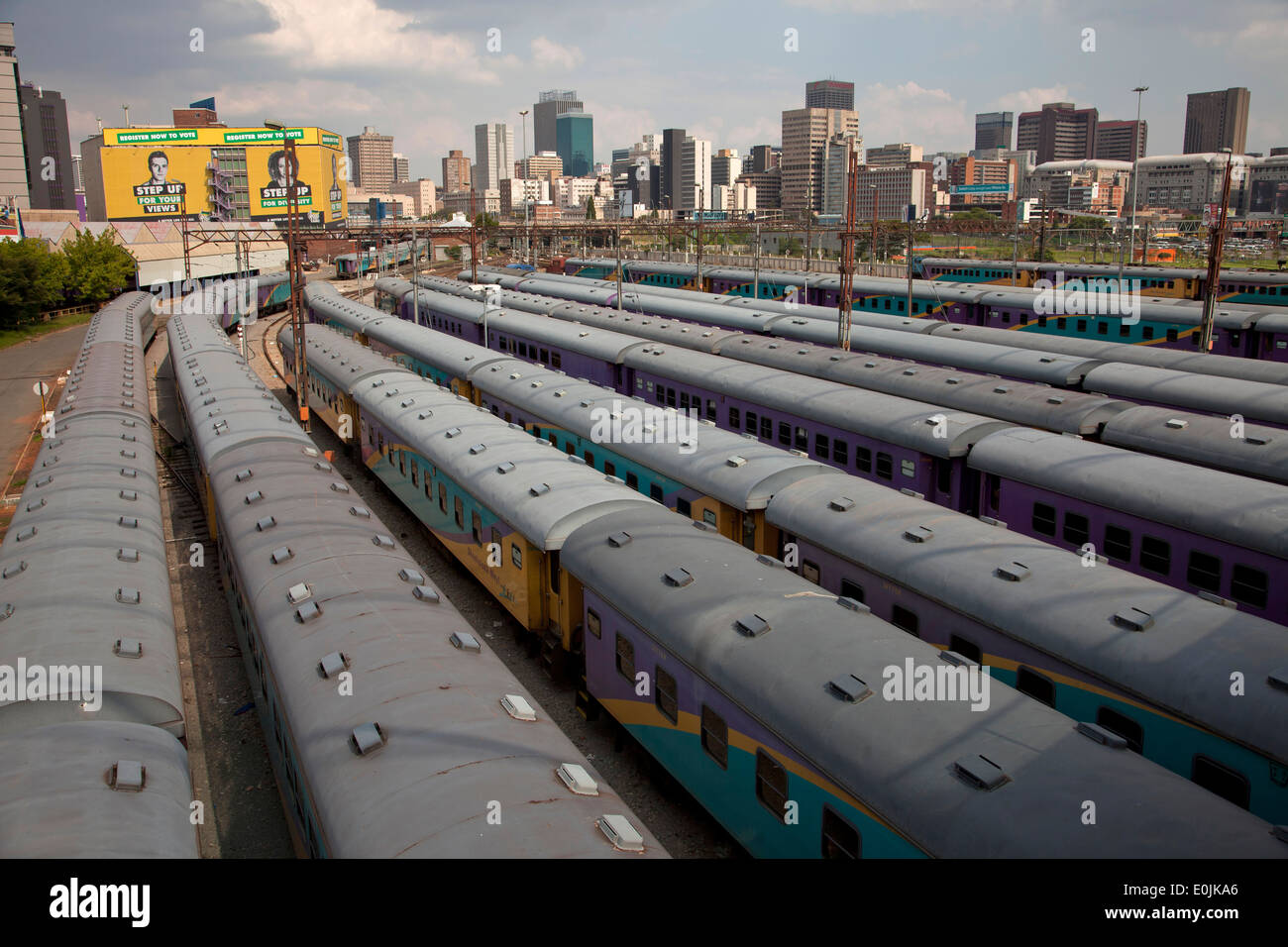 trains and tracks of the central Park Station and the skyline of ...