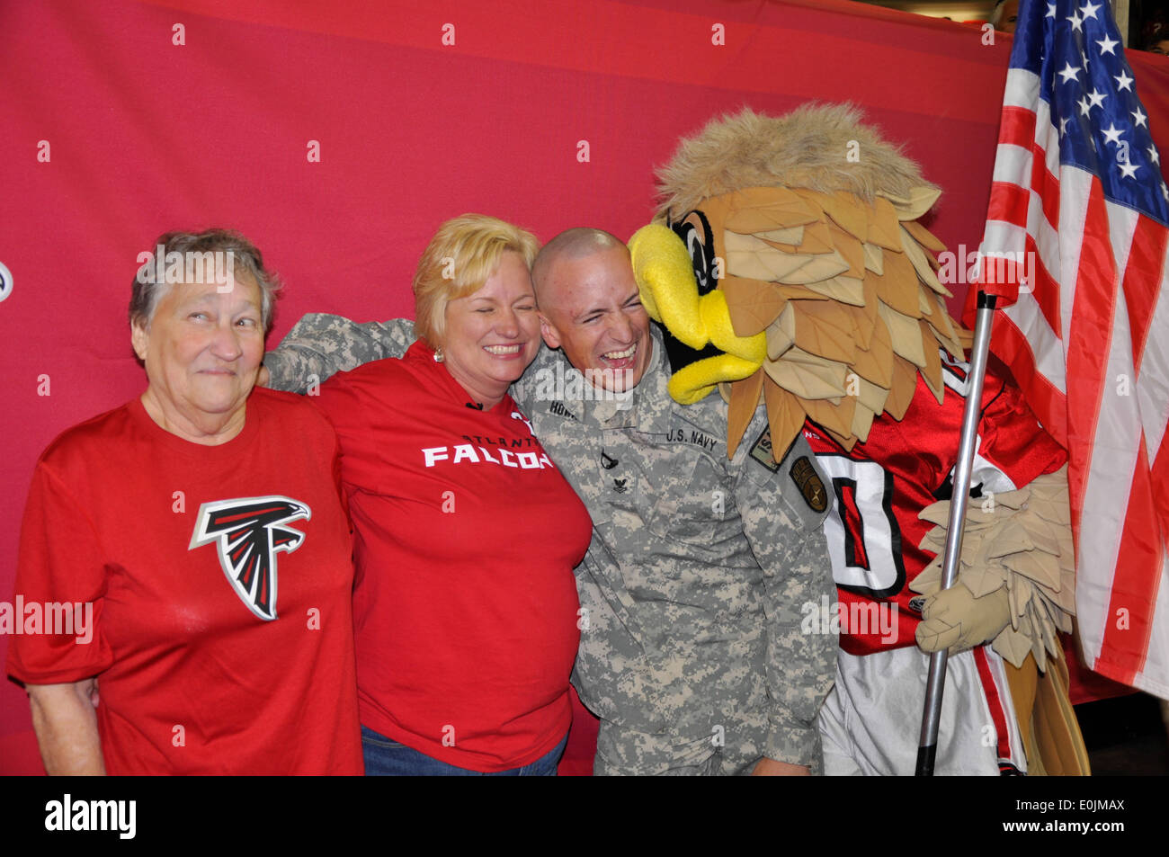 Navy Petty Officer Jeff Howard surprises his mother and grandmother at ...