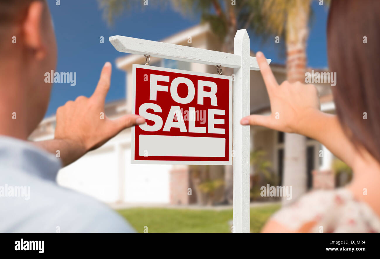 For Sale Real Estate Sign, House and Military Couple Framing Hands in Front Stock Photo - Alamy