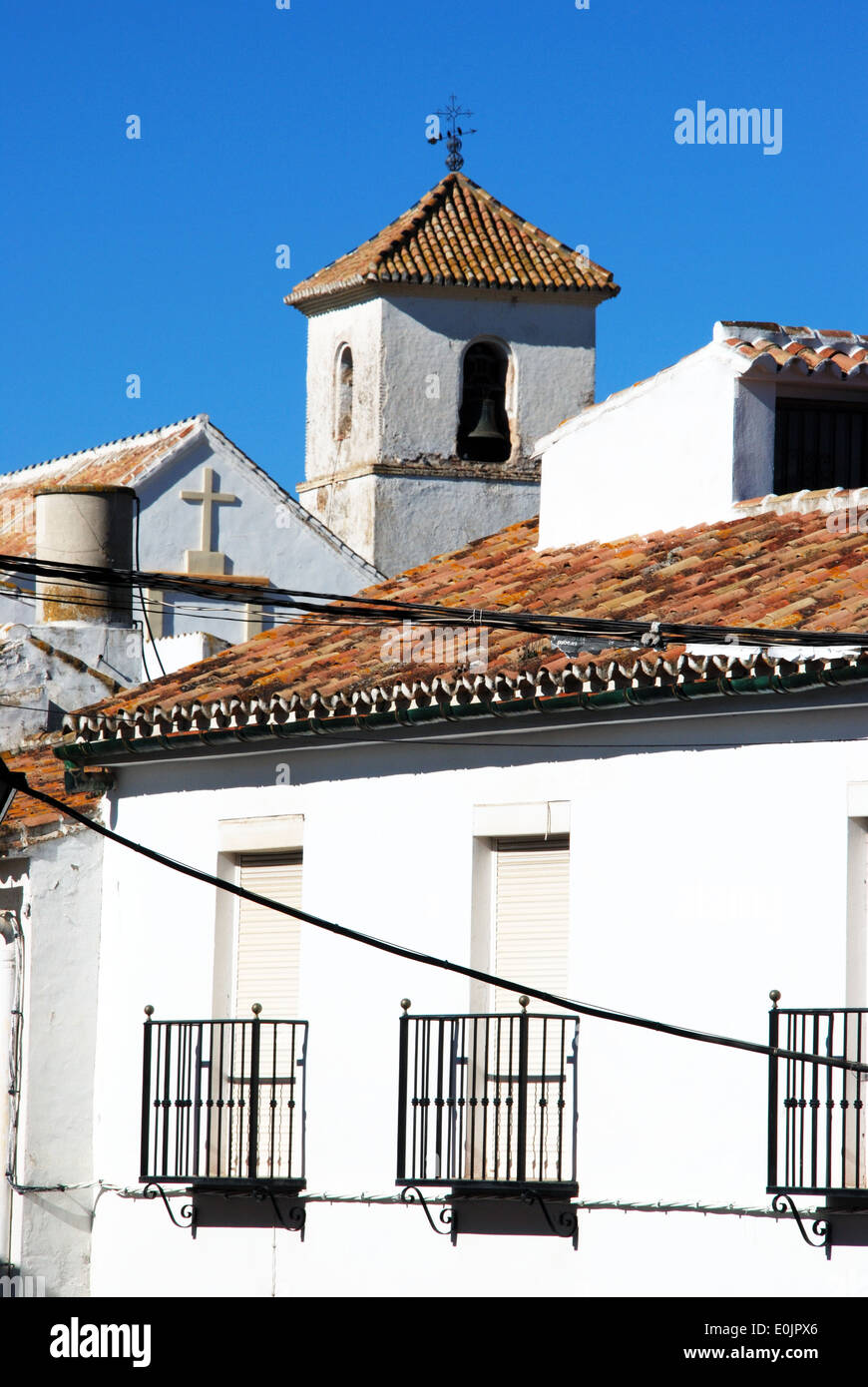 Townhouse with church bell tower to the rear, Colmenar, Andalusia ...