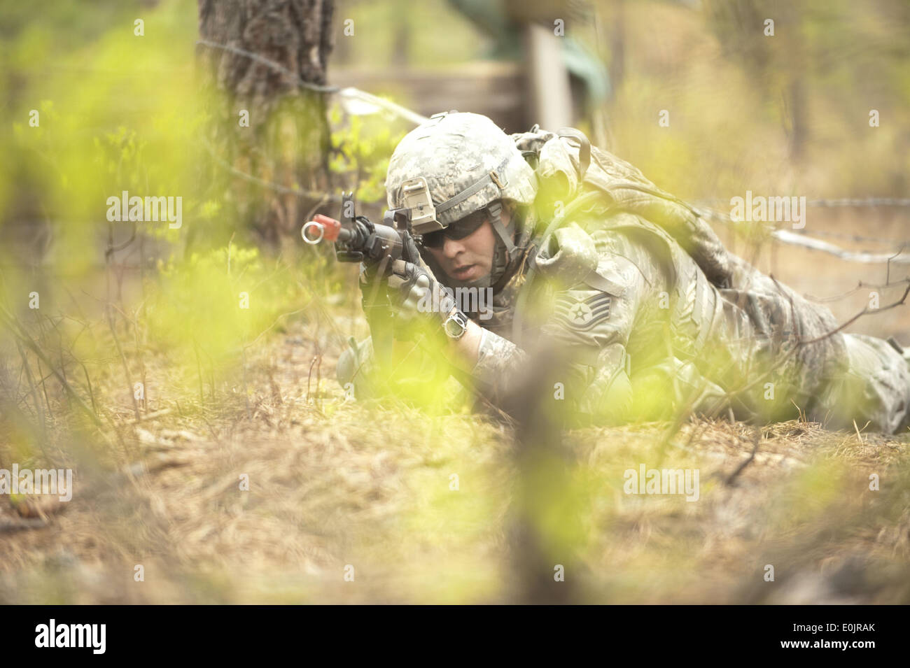 A U.S. Air Force airmen provides suppressing fire during an Army ...
