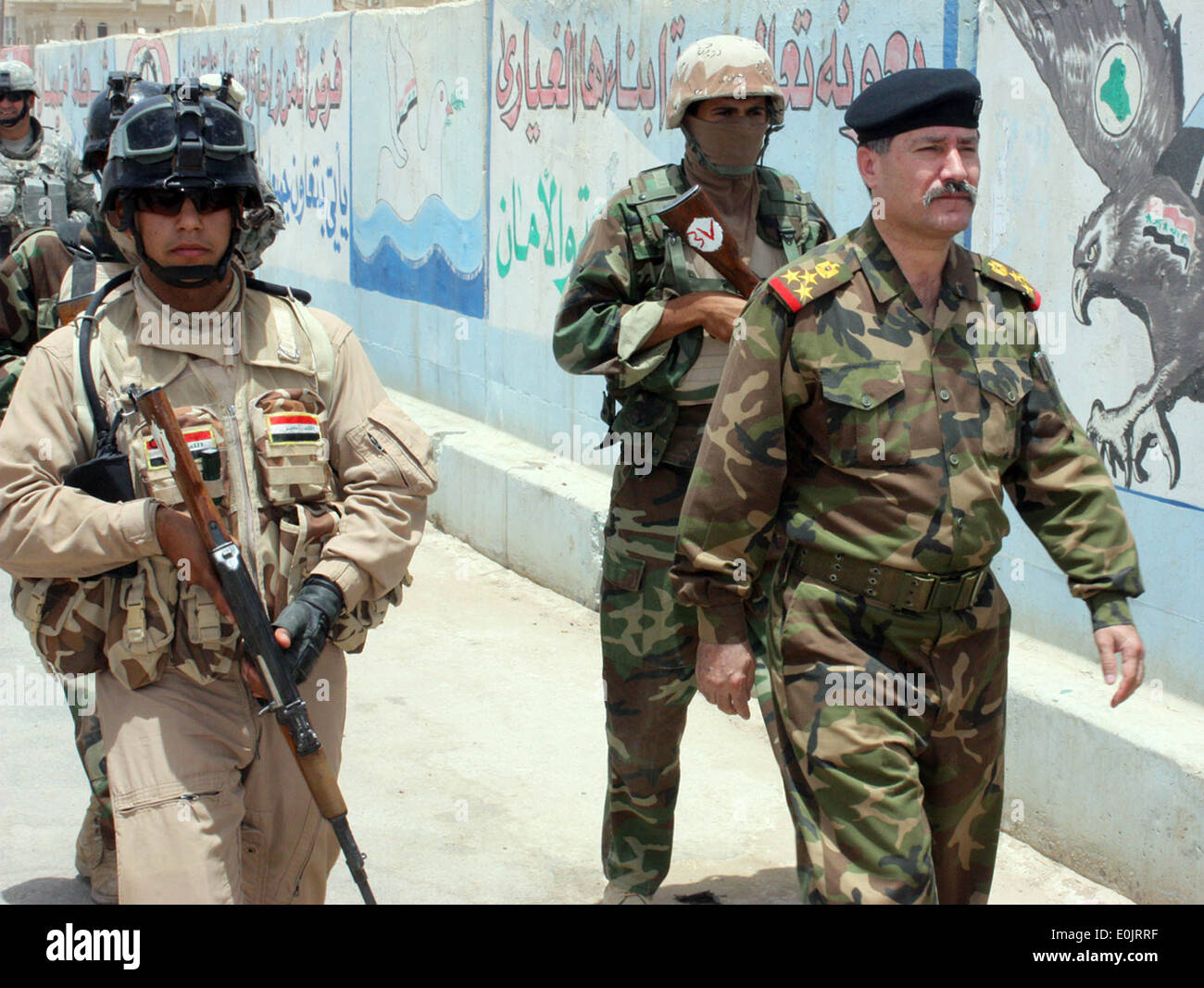 An Iraqi Army personal security detachment guards an Iraqi Army Stock ...