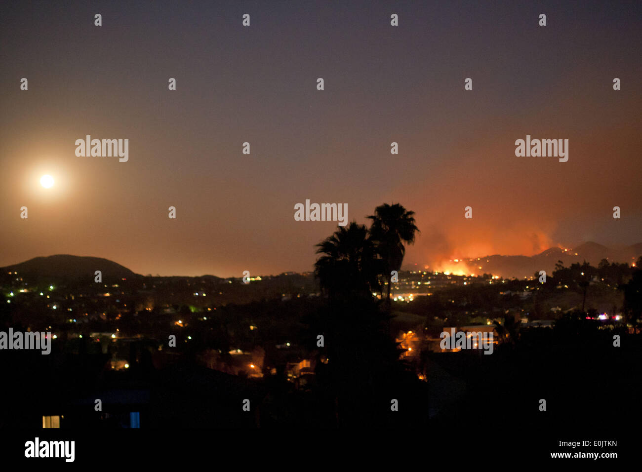 Vista, California, USA. 14th May, 2014. Fires burn on the hillside seen ...