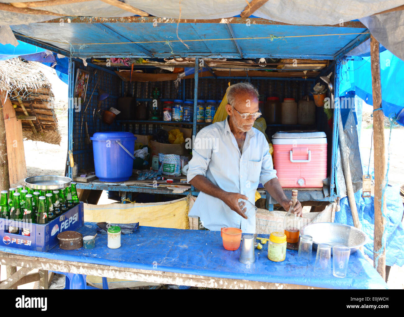 Indian man making tea hi-res stock photography and images - Alamy