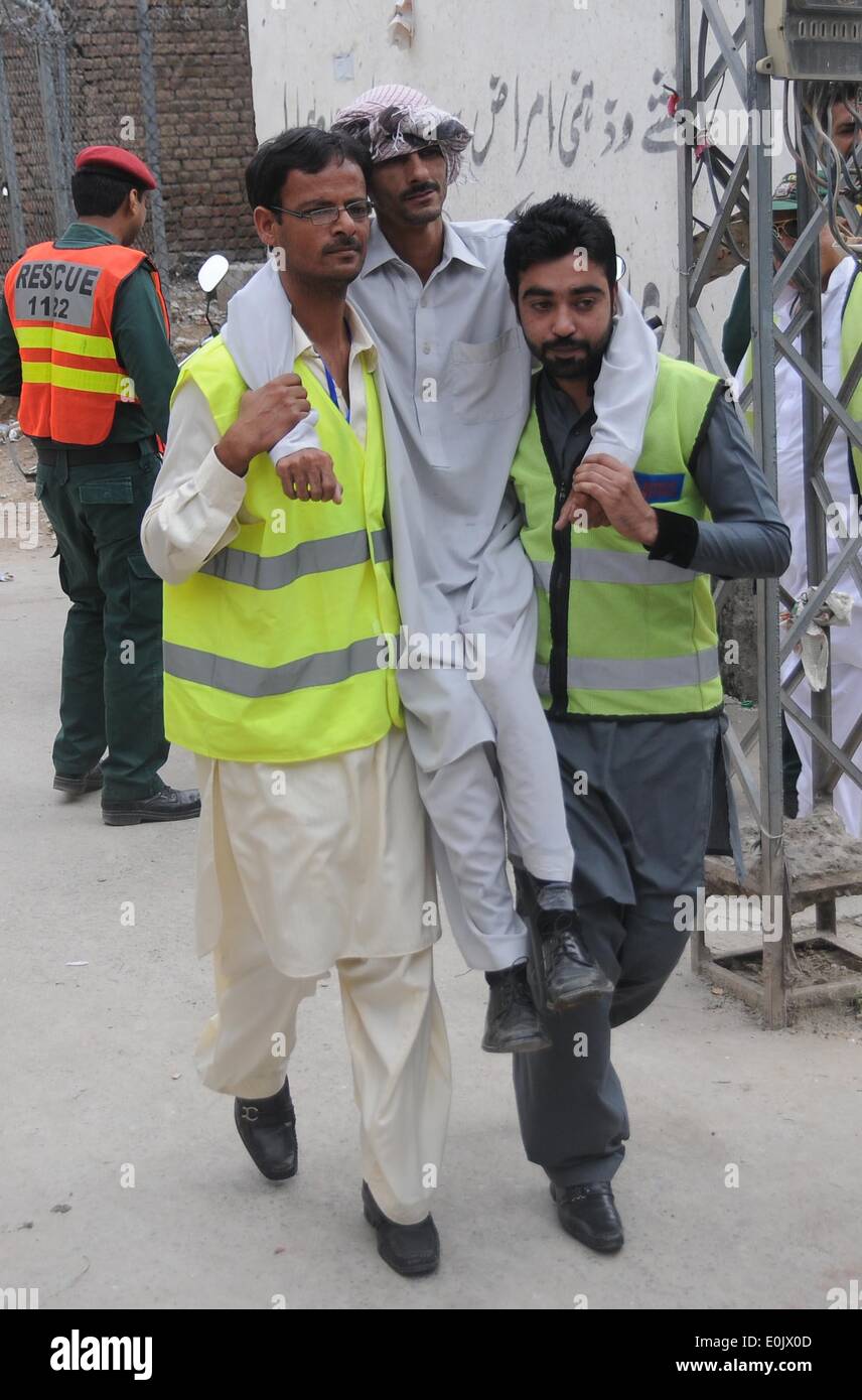 Rawalpindi, Pakistan. 15th May, 2014. Members of Pakistani rescuers and ...