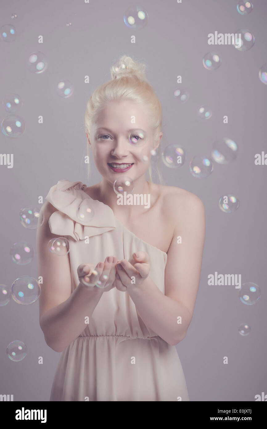 Blond woman with soap bubbles hi-res stock photography and images - Alamy