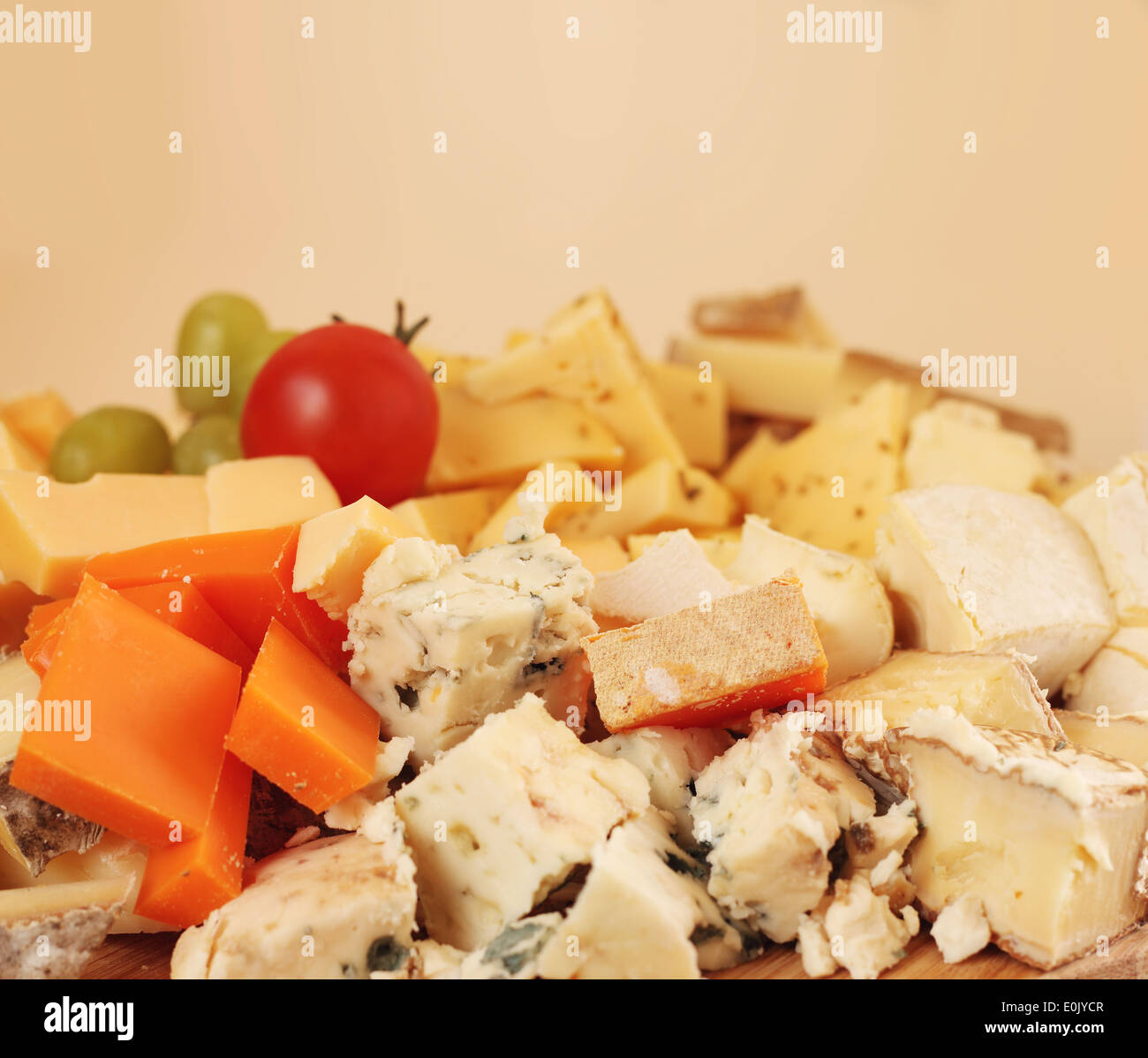 Cut french cheese blocks background close-up Stock Photo - Alamy