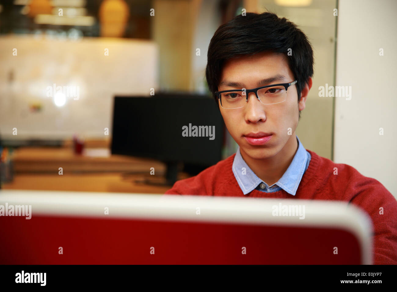 Young asian programmer working hi-res stock photography and images - Alamy