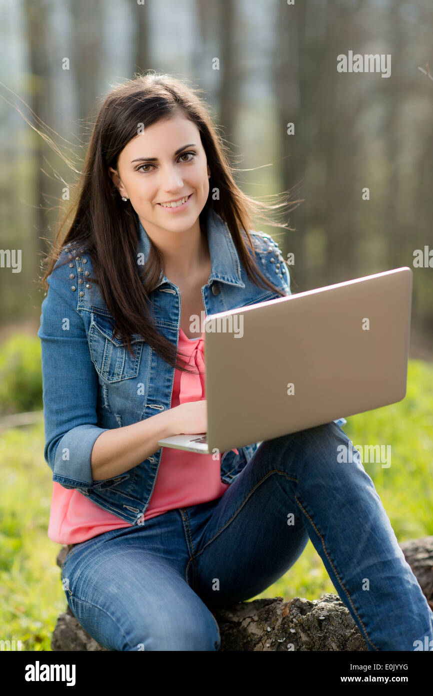 woman with laptop in nature , (Model release Stock Photo - Alamy