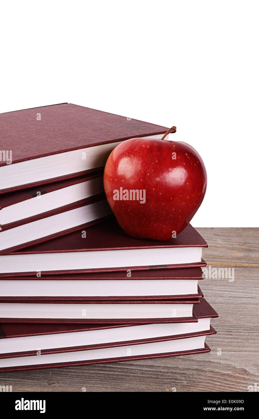 Book with apple isolated on white background Stock Photo - Alamy
