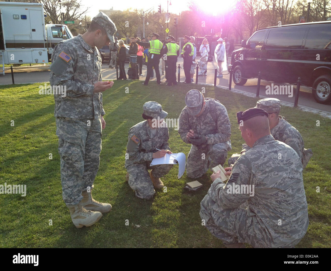 Soldiers and airmen of the Massachusetts National Guard muster on the ...