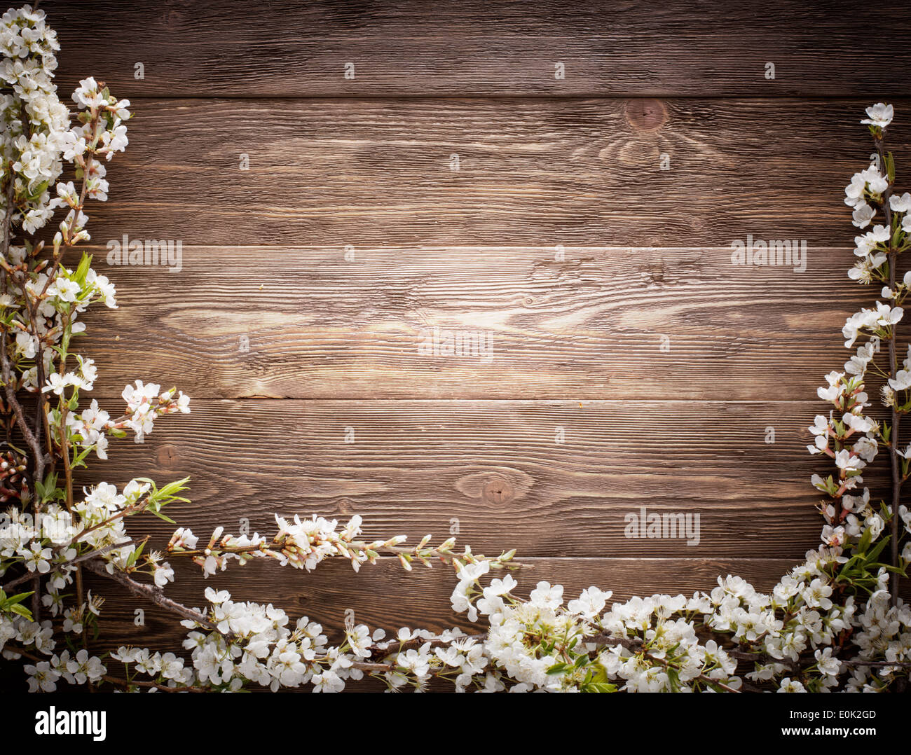 Flowers on wood texture background Stock Photo - Alamy