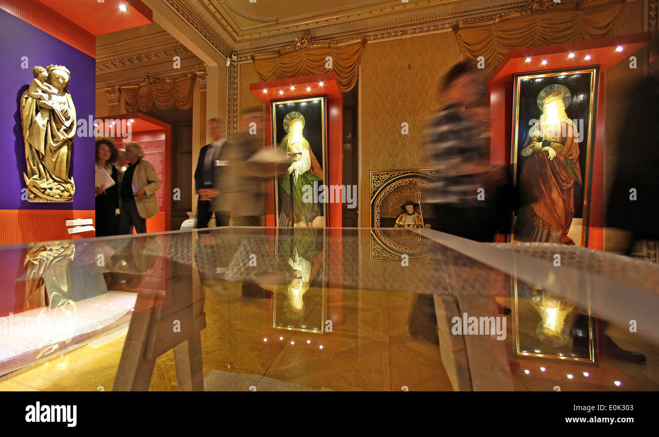 Altenburg, Germany. 15th May, 2014. People walk through the exhibition ...