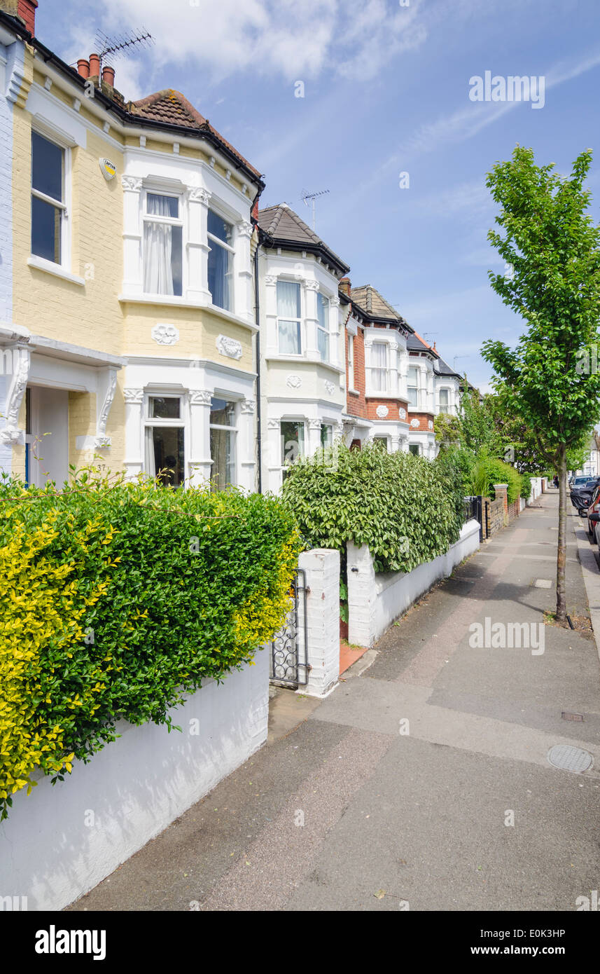 Residential street of two-storey terraced houses in the London district ...