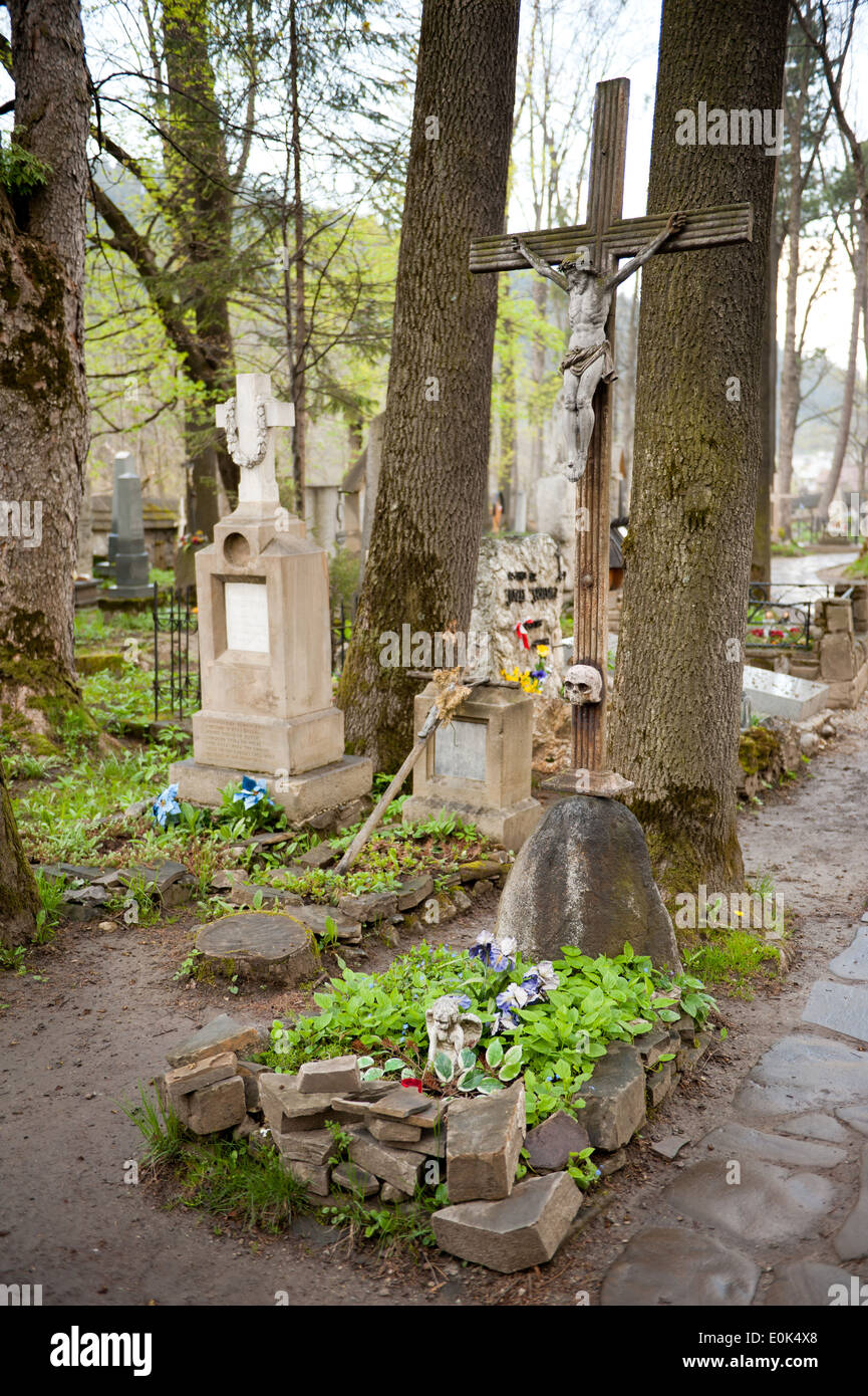 Cross at the cemetery hi-res stock photography and images - Alamy