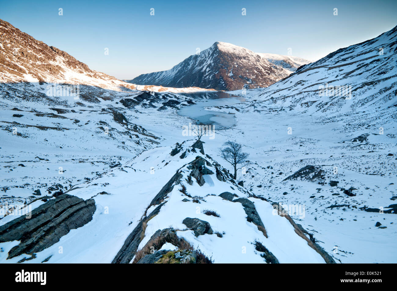 Llyn Idwal in Winter backed by Pen yr Ole Wen, Cwm Idwal, Snowdonia ...