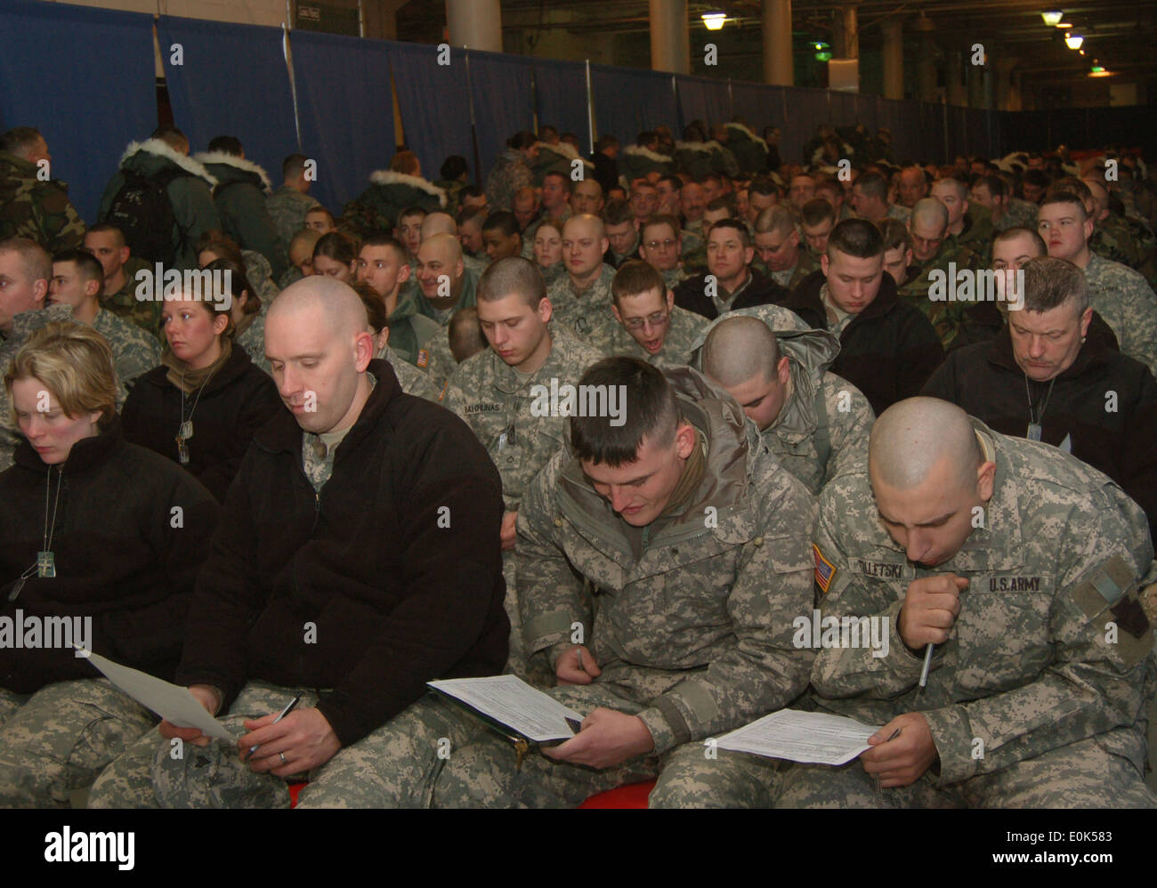 Pennsylvania and Delaware National Guard members listen attentively to ...