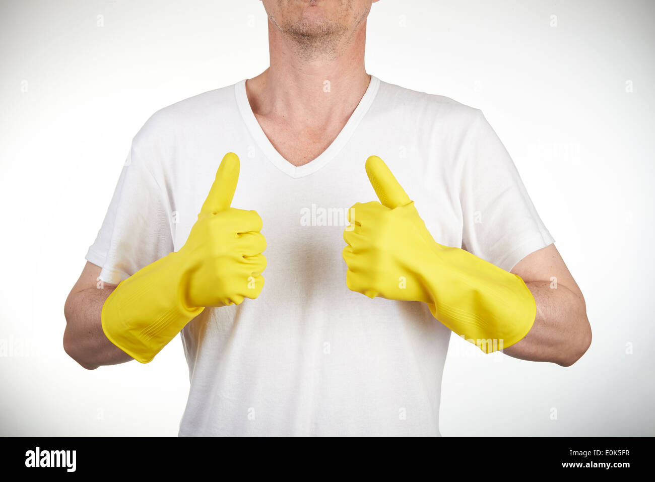 hand with yellow cleaning product glove showing thumb up. Cleaning's ...