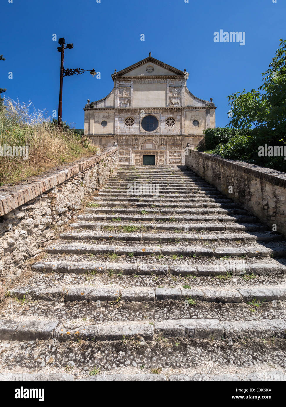 view of the facade and the stairs of the Romanesque church of San ...