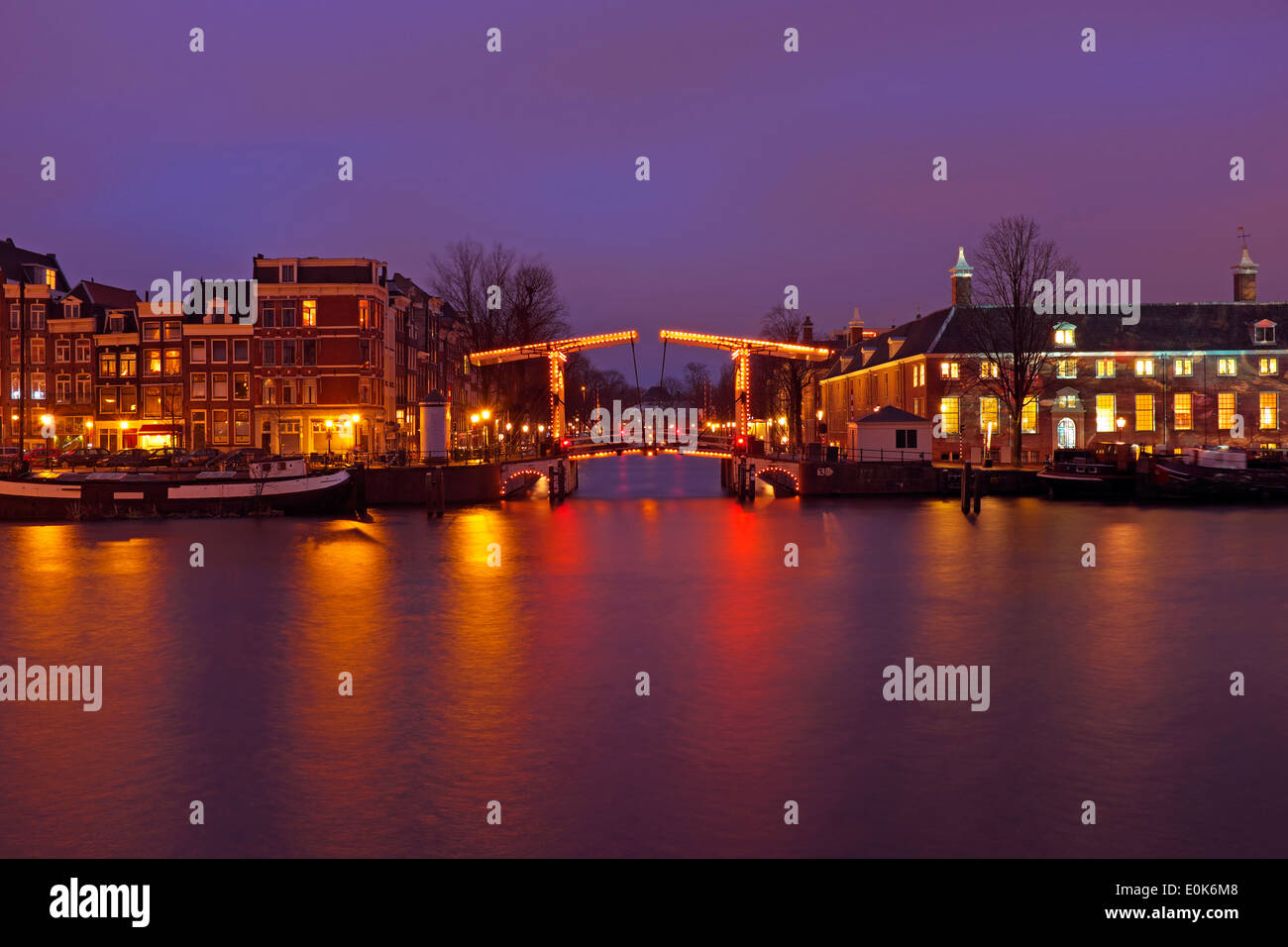 City scenic from Amsterdam in the Netherlands by night Stock Photo - Alamy