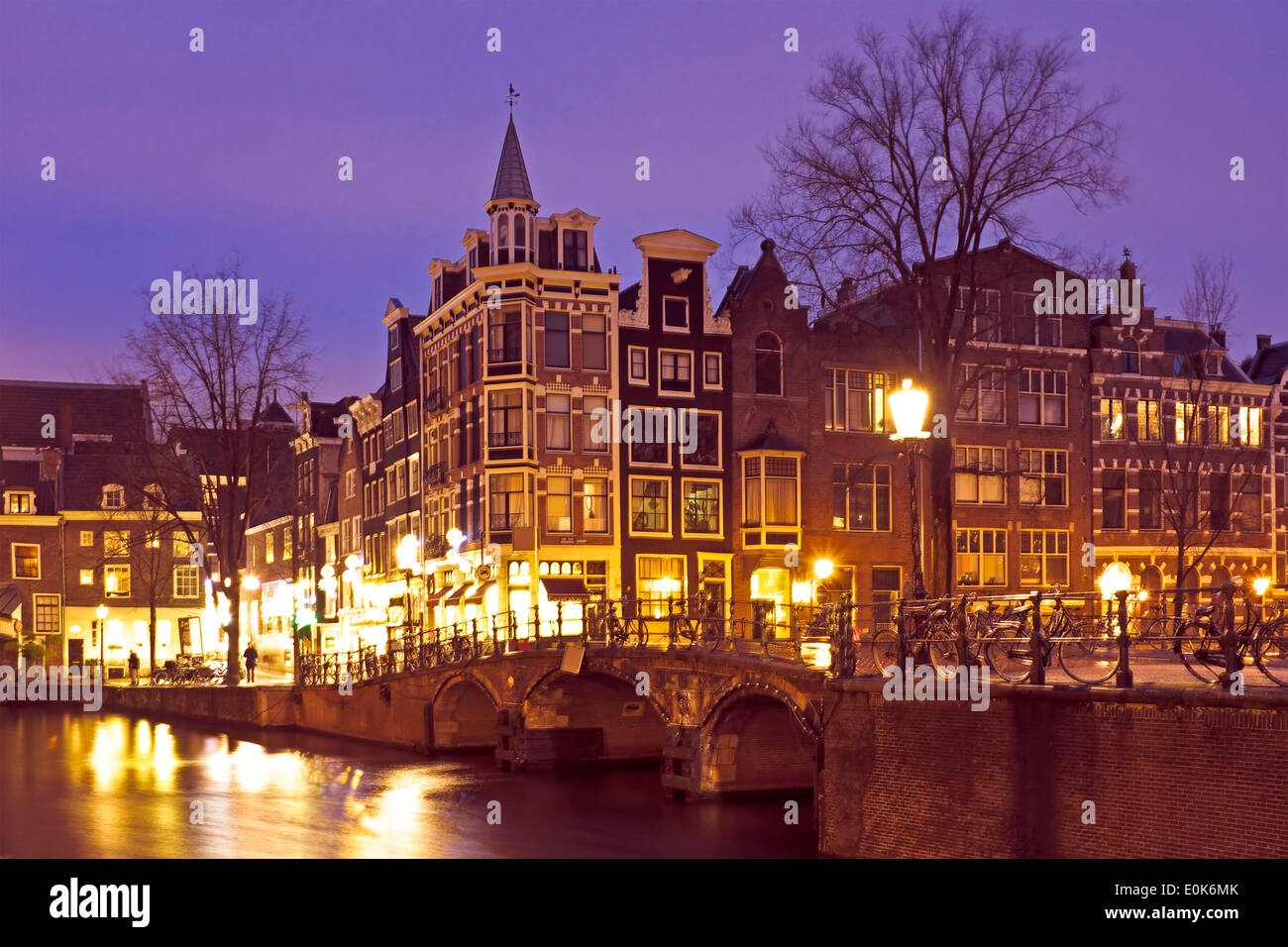 City scenic from Amsterdam in the Netherlands by night Stock Photo - Alamy