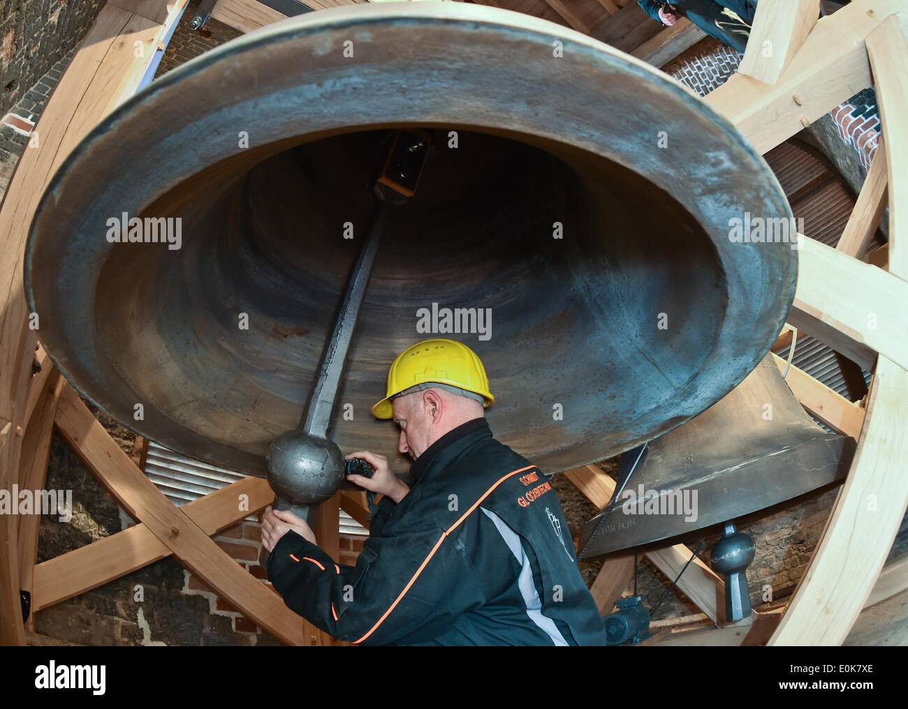 Employee Henry Loesche from Schmidt Bell Technology works to install ...
