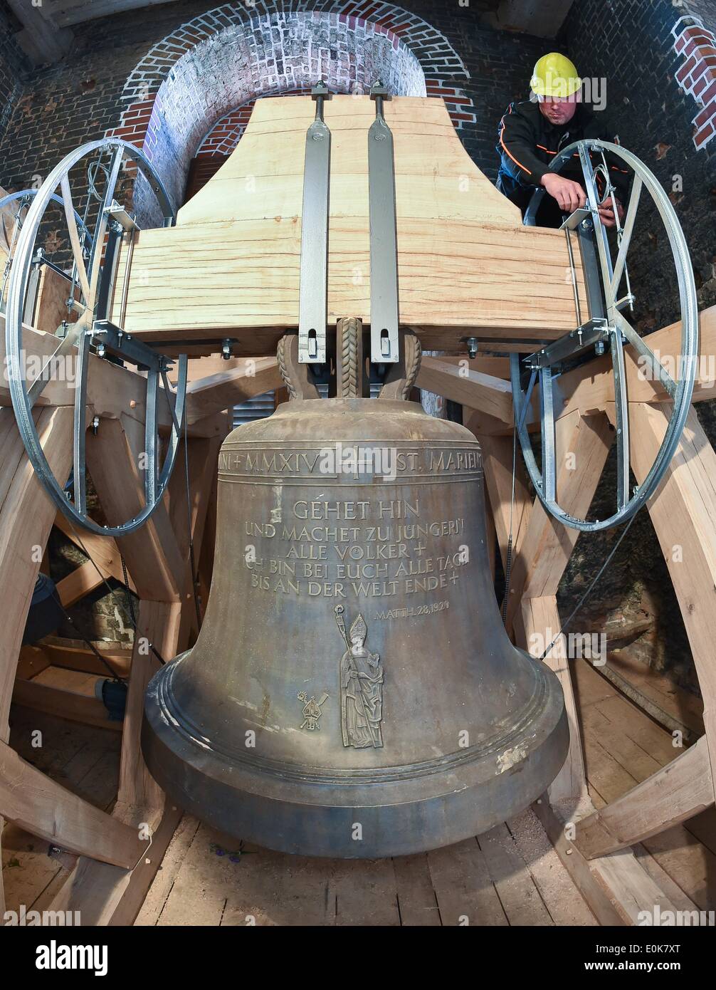 Employee Henry Loesche from Schmidt Bell Technology works to install ...