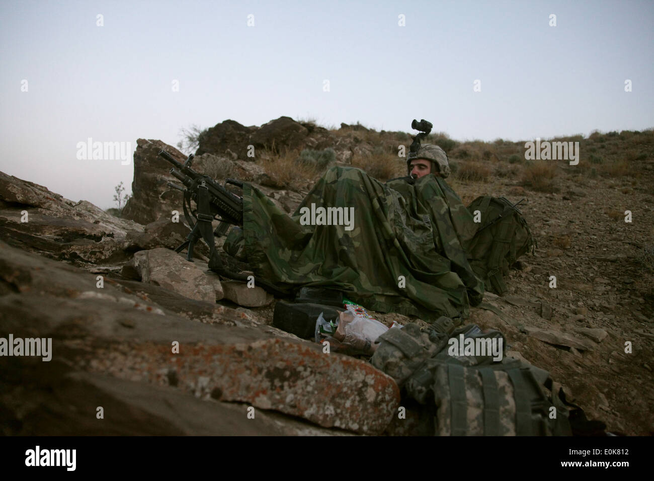 U.S. Army Spc. Patrick Sick, from Canandaigua, N.Y., tries to stay warm ...
