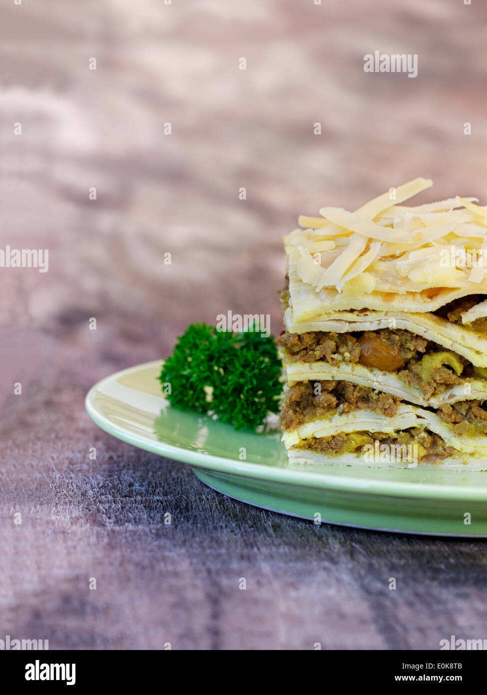 South African bobotie dish layered with pancakes Stock Photo - Alamy