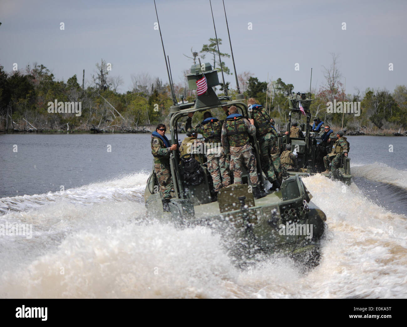 Sailors with Riverine Squadron 3 train Marines from the Royal ...