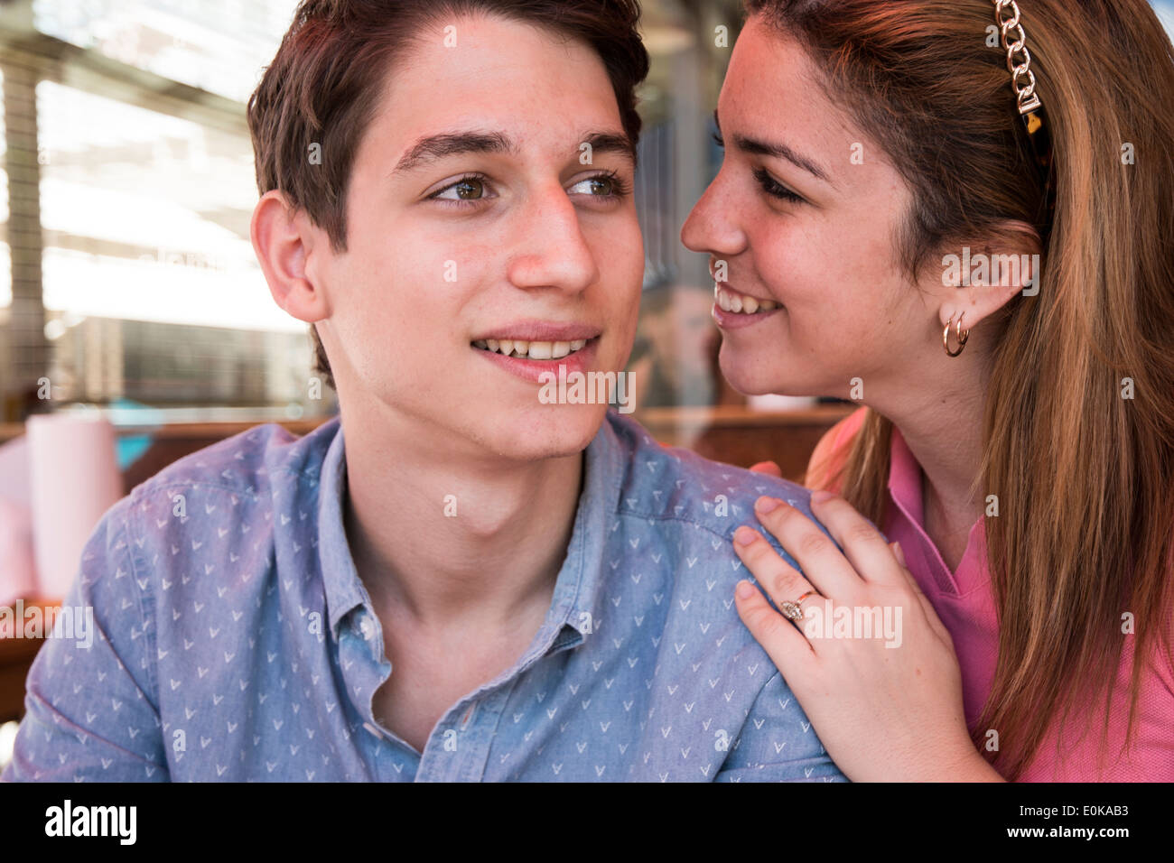 Two teenagers laughing indoors hi-res stock photography and images - Alamy