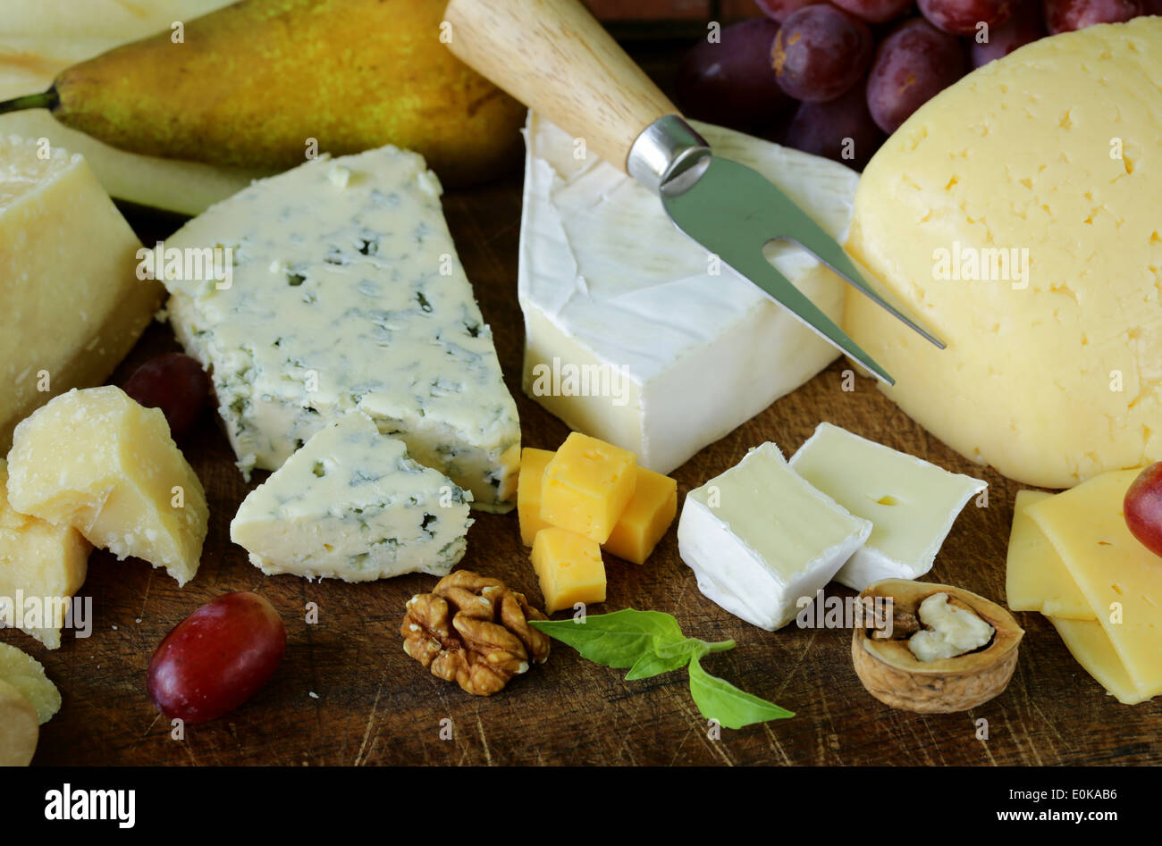 cheeseboard with assorted cheeses (parmesan, brie, blue, cheddar Stock ...