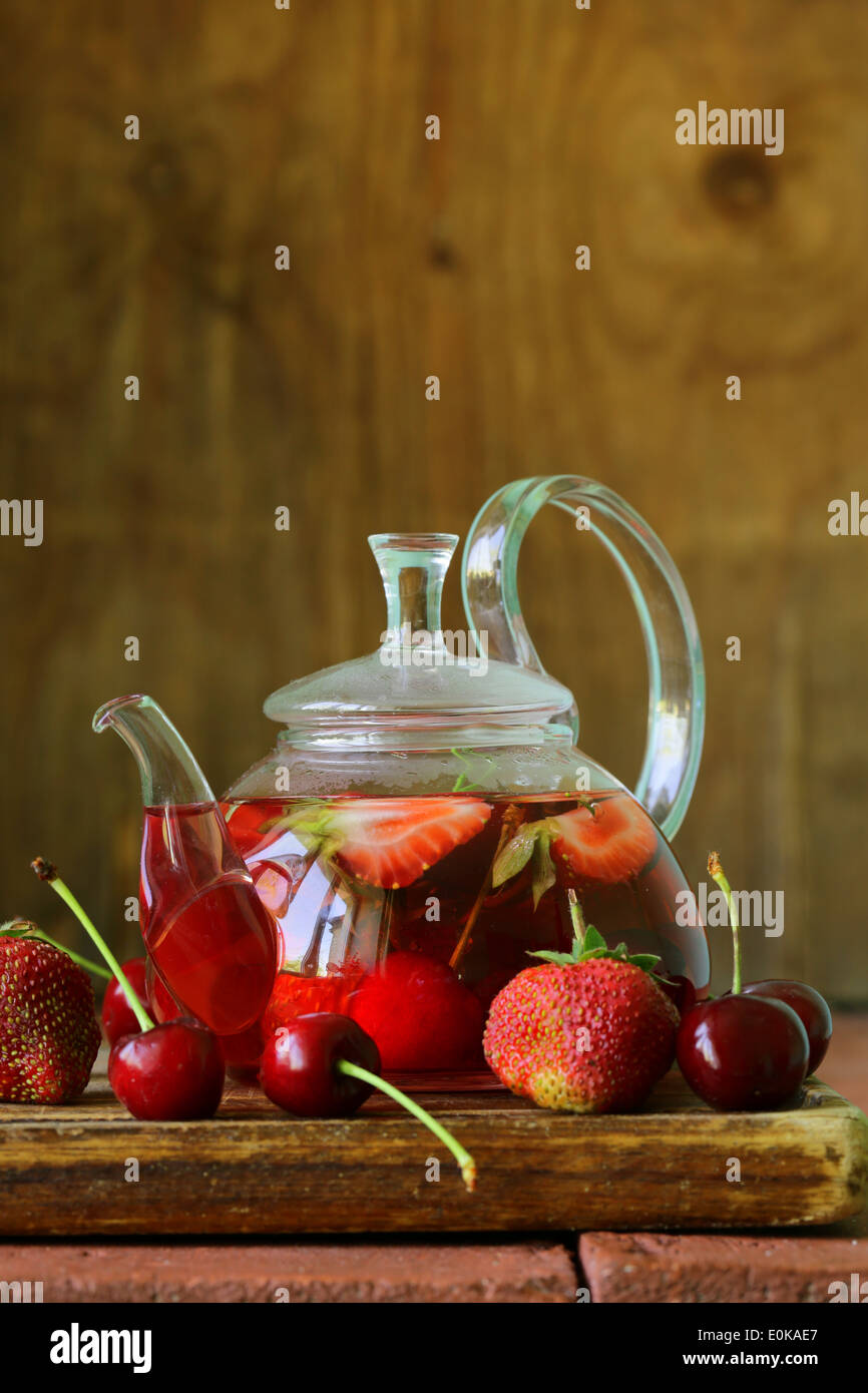 summer fruit tea with a variety of berries (cherry, strawberry Stock ...